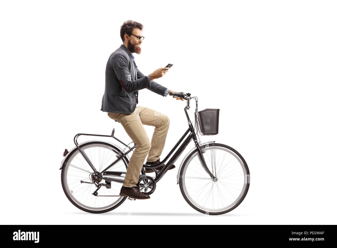 Young man riding a bicycle and looking at his phone isolated on white ...