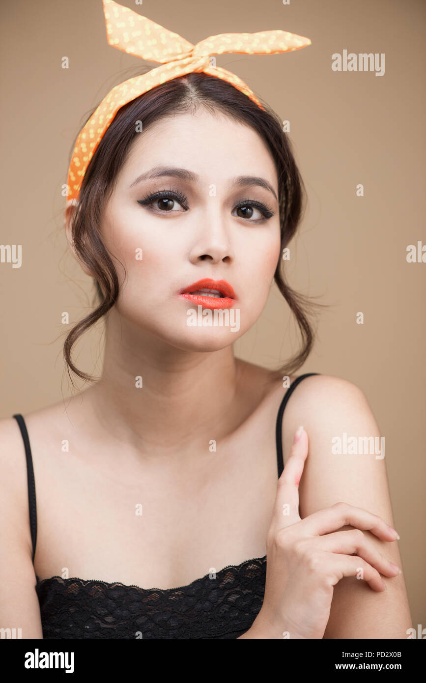 Beautiful woman pinup style portrait. Asian woman Stock Photo - Alamy