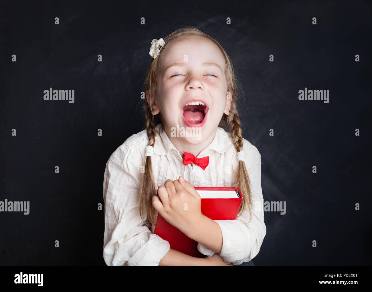 Kids laughing and school hi-res stock photography and images - Alamy