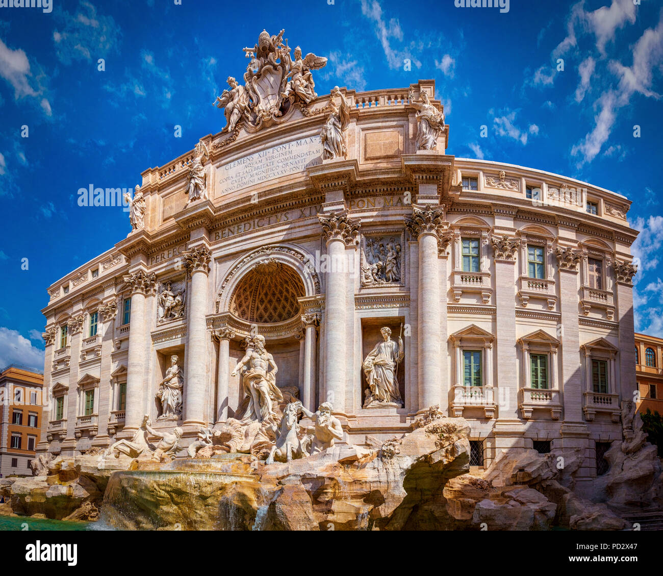 The famous Baroque Trevi Fountain with Palazzo Poli behind, Rome Italy ...