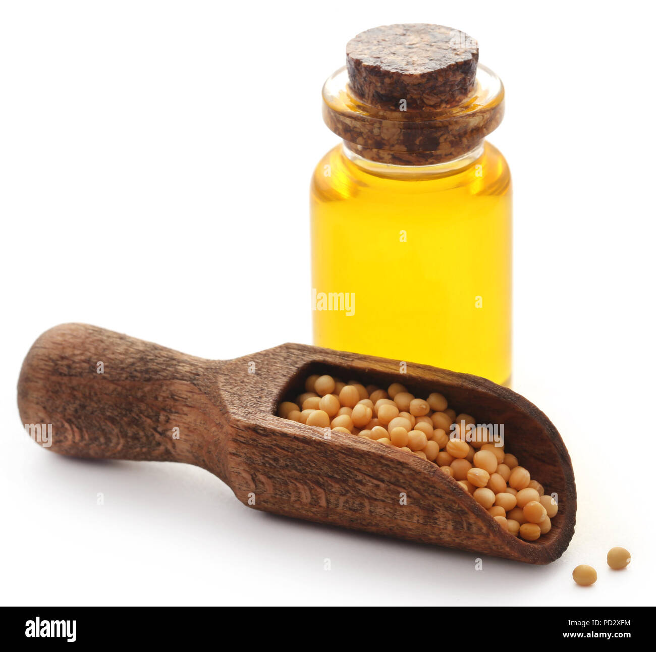 Golden Mustard with oil in a bottle over white background Stock Photo ...