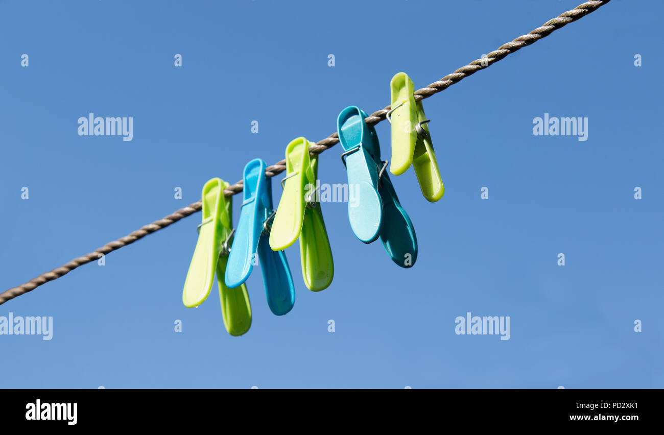 Coloured pegs hi-res stock photography and images - Alamy
