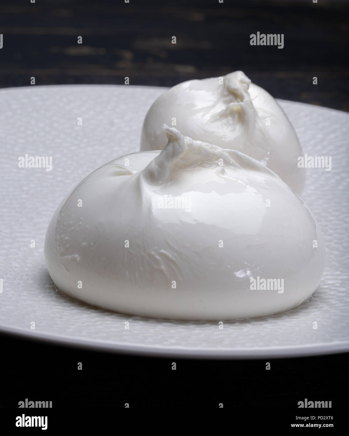 Fresh soft white burrata, ball buttery cheese, made from a mix of ...