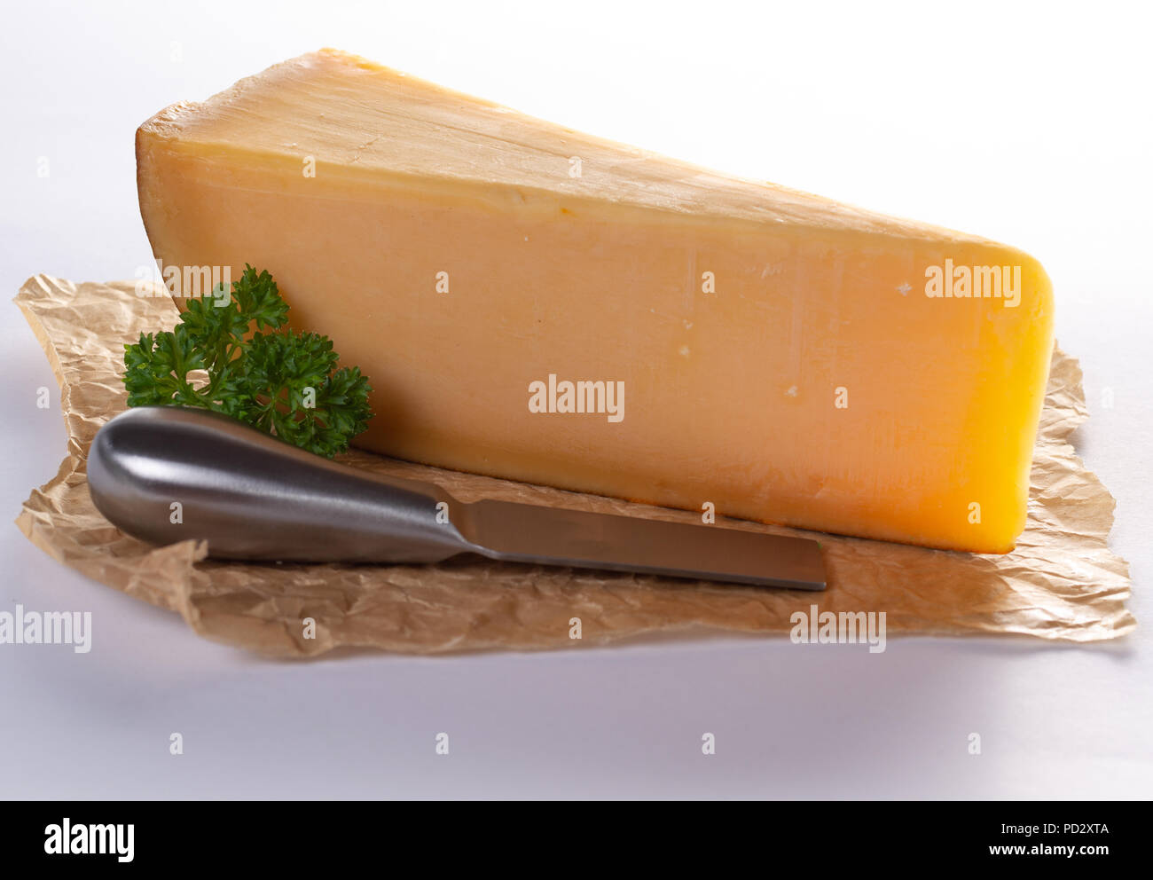 Dutch old Amsterdam cheese, made from cow milk on white background ...