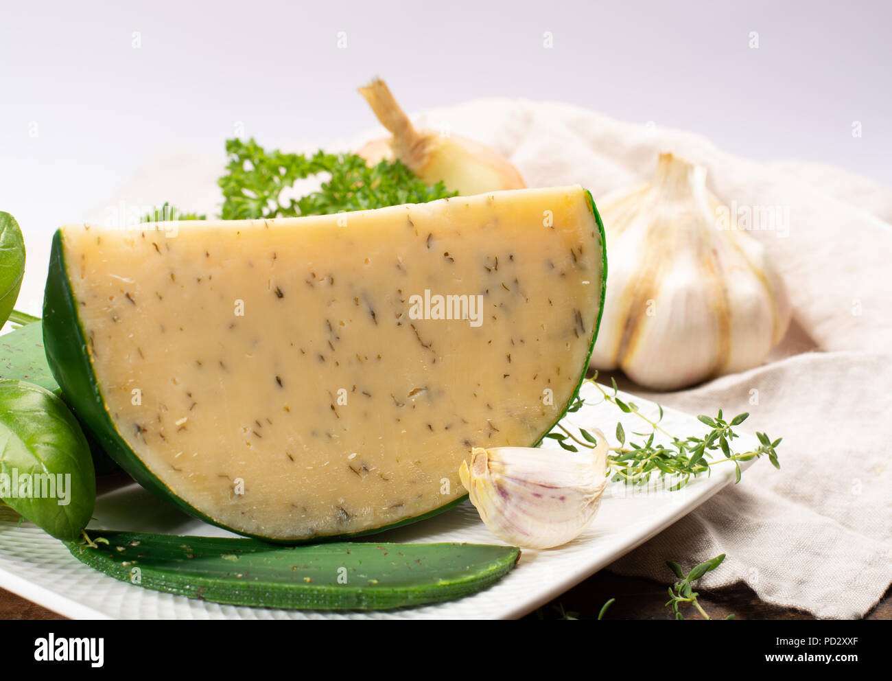 Dutch specialty hard cheese made from cows milk with different spices ...
