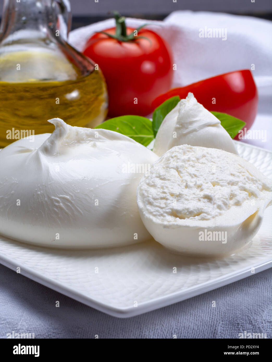 Fresh soft white burrata, ball buttery cheese, made from a mix of ...