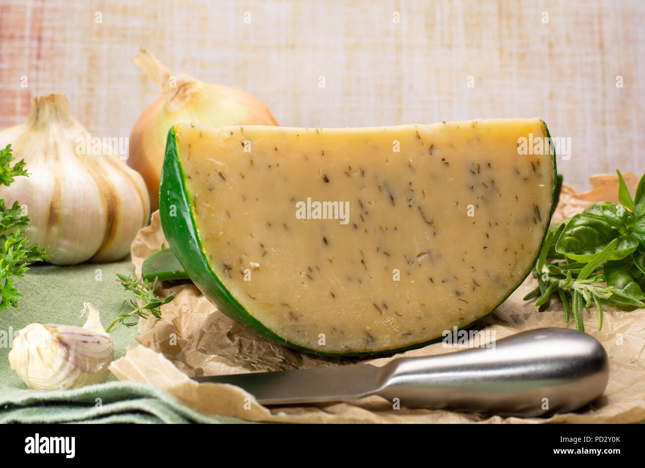 Dutch specialty hard cheese made from cows milk with different spices ...