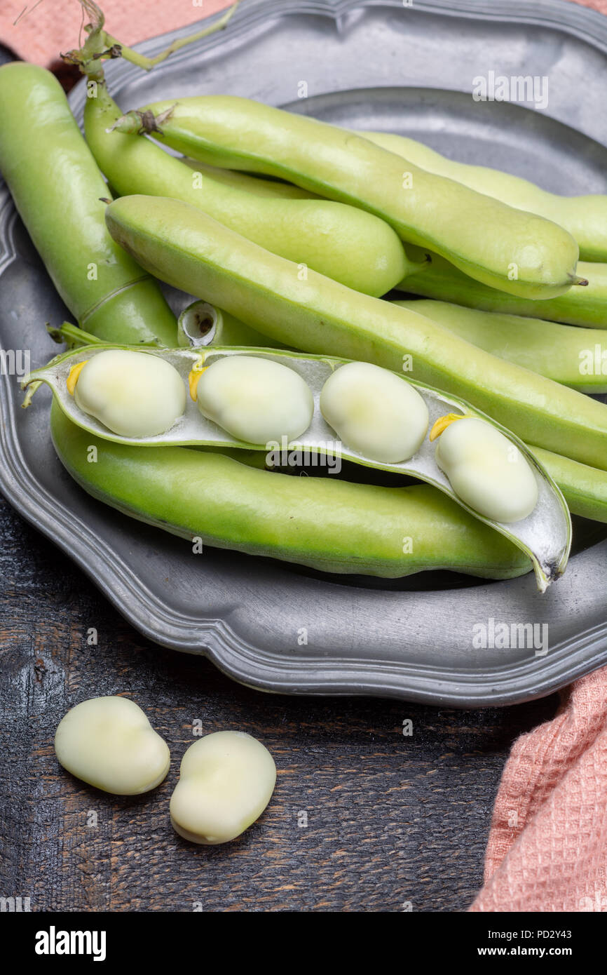 New harvest of healthy vegetables, green fresh raw big broad beans ...