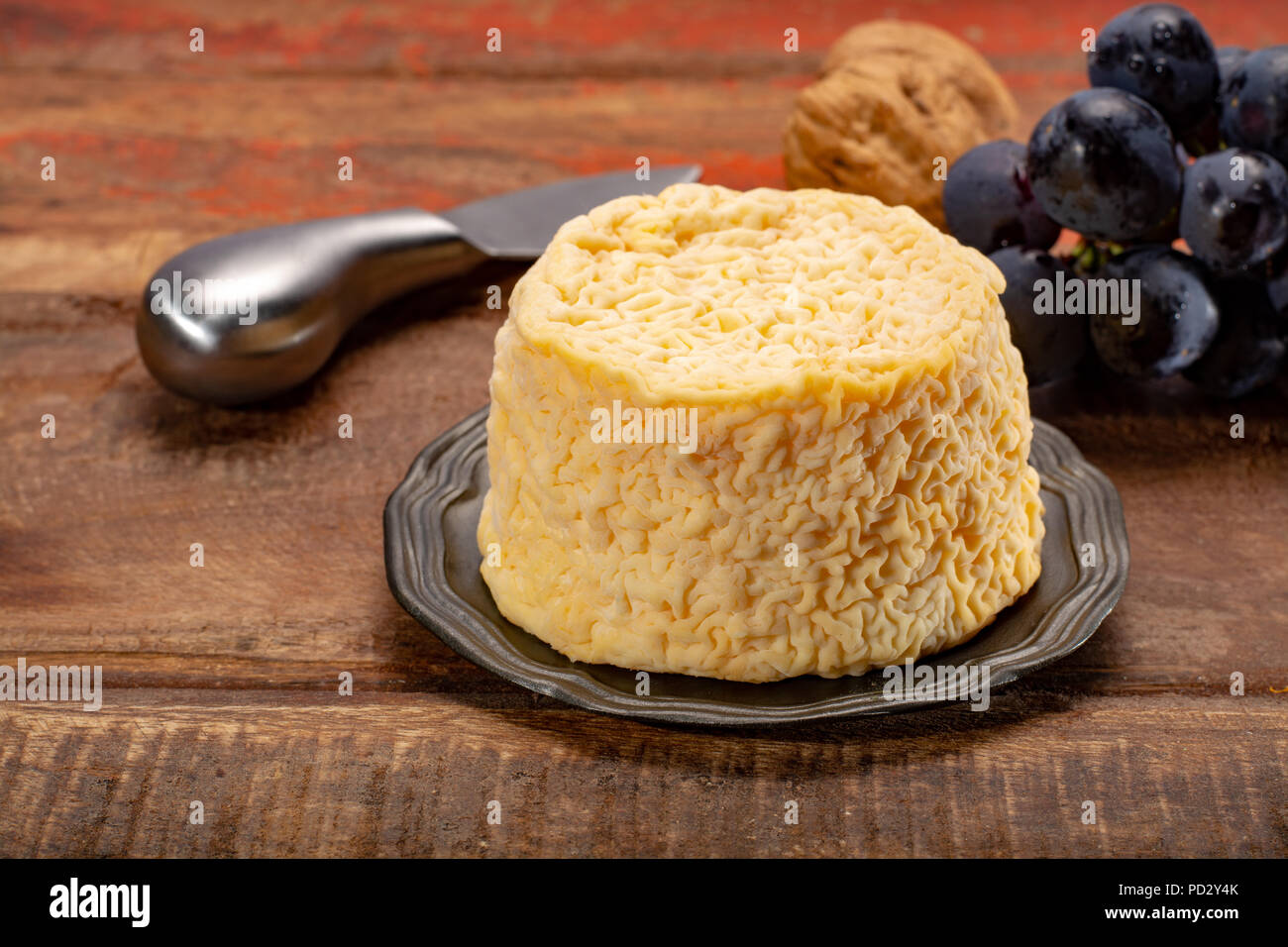 French Langres soft cows crumbly cheese with washed rind structure made ...