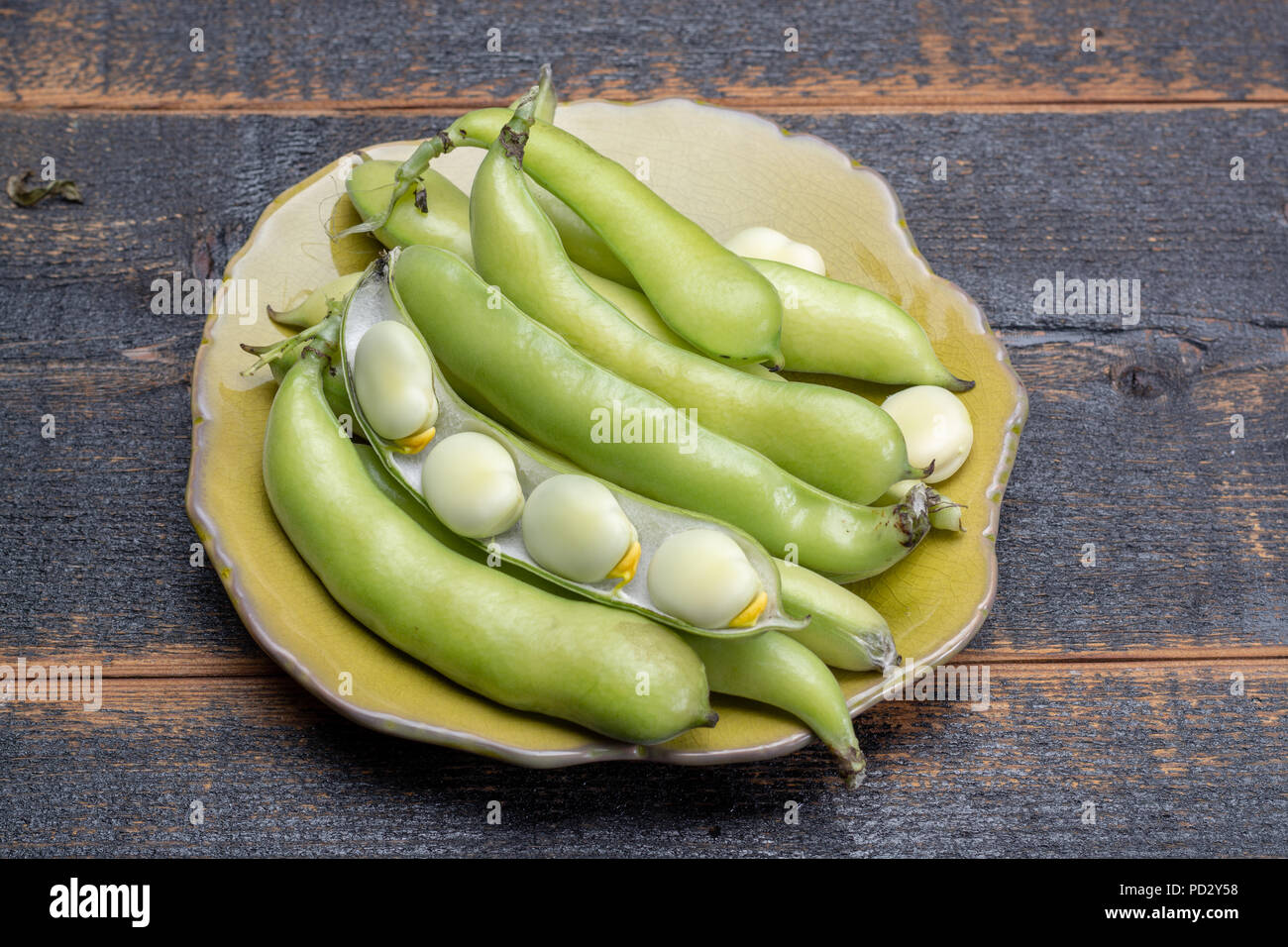 New harvest of healthy vegetables, green fresh raw big broad beans ...