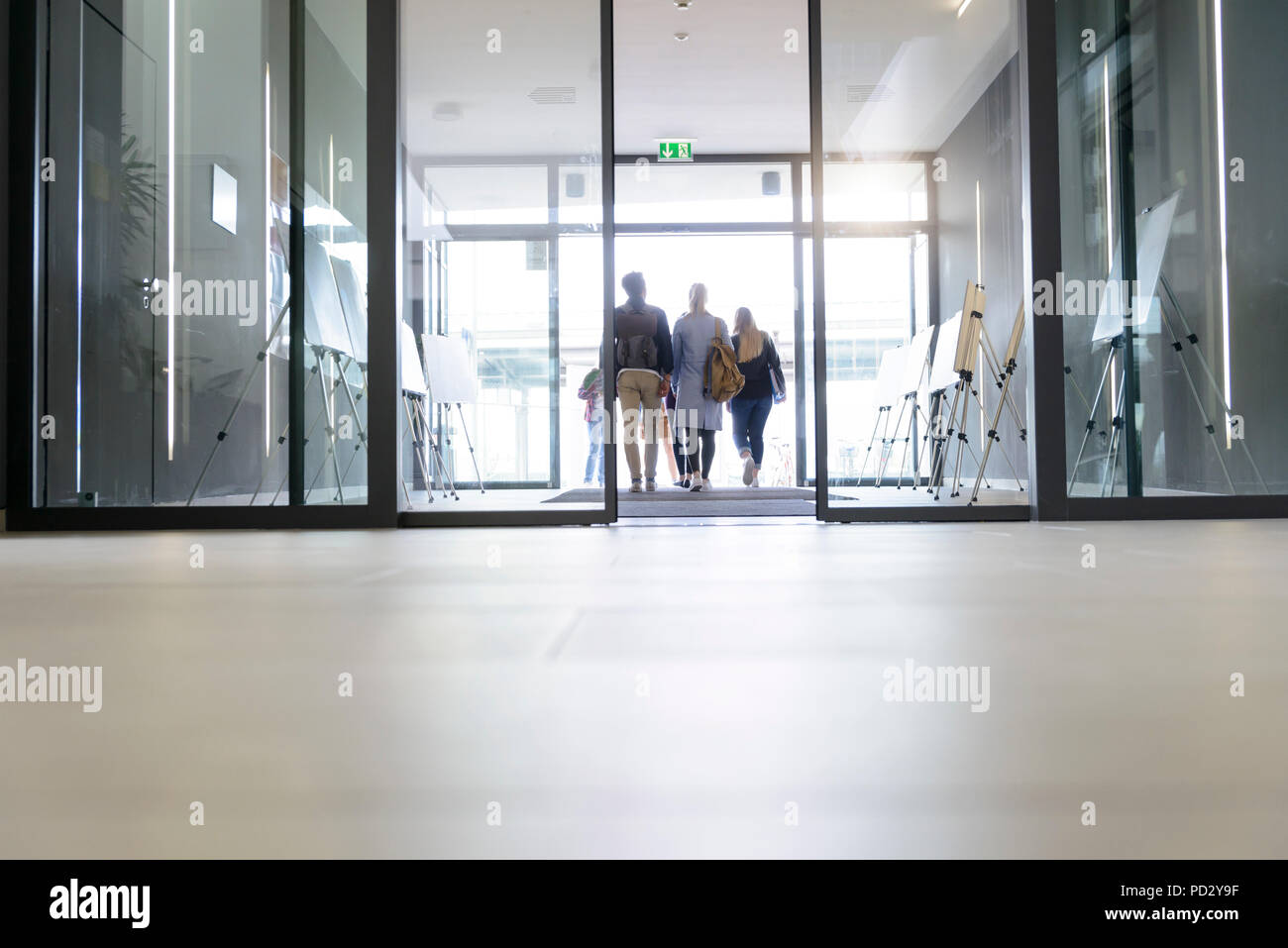Man leaving building rear view hi-res stock photography and images - Alamy
