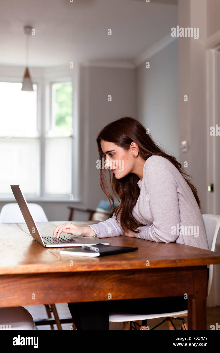 Leaning forward table hi-res stock photography and images - Alamy