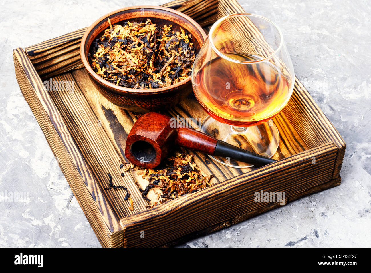 Pipe tobacco brandy cognac hi-res stock photography and images - Alamy