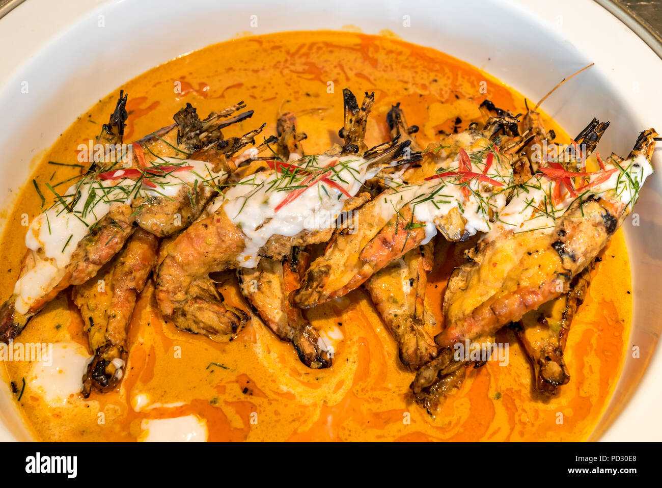 Tiger Prawn Red coconut Pa Naeng Curry Stock Photo - Alamy