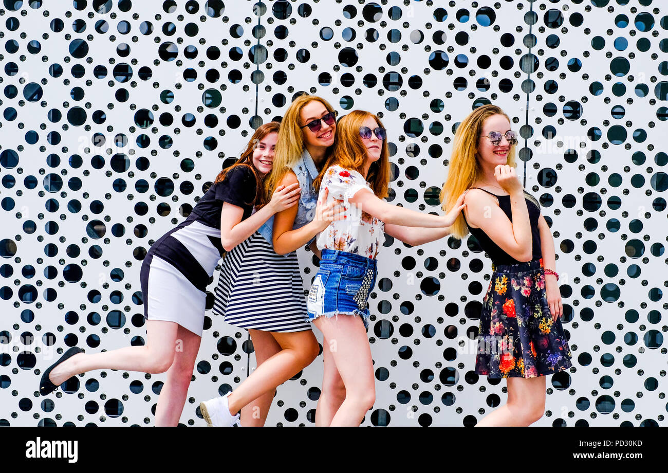 Posing against for hi-res stock photography and images - Alamy