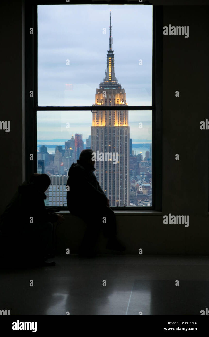 Empire state building through window hi-res stock photography and ...