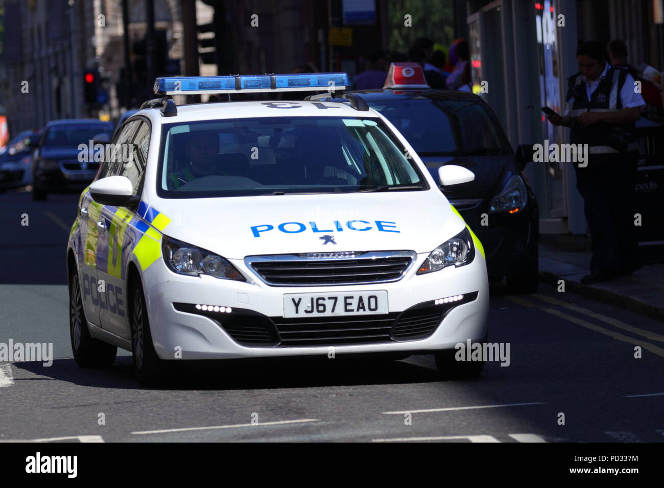 A Peugeot Police Car of West Yorkshire Police Force patrolling Leeds ...