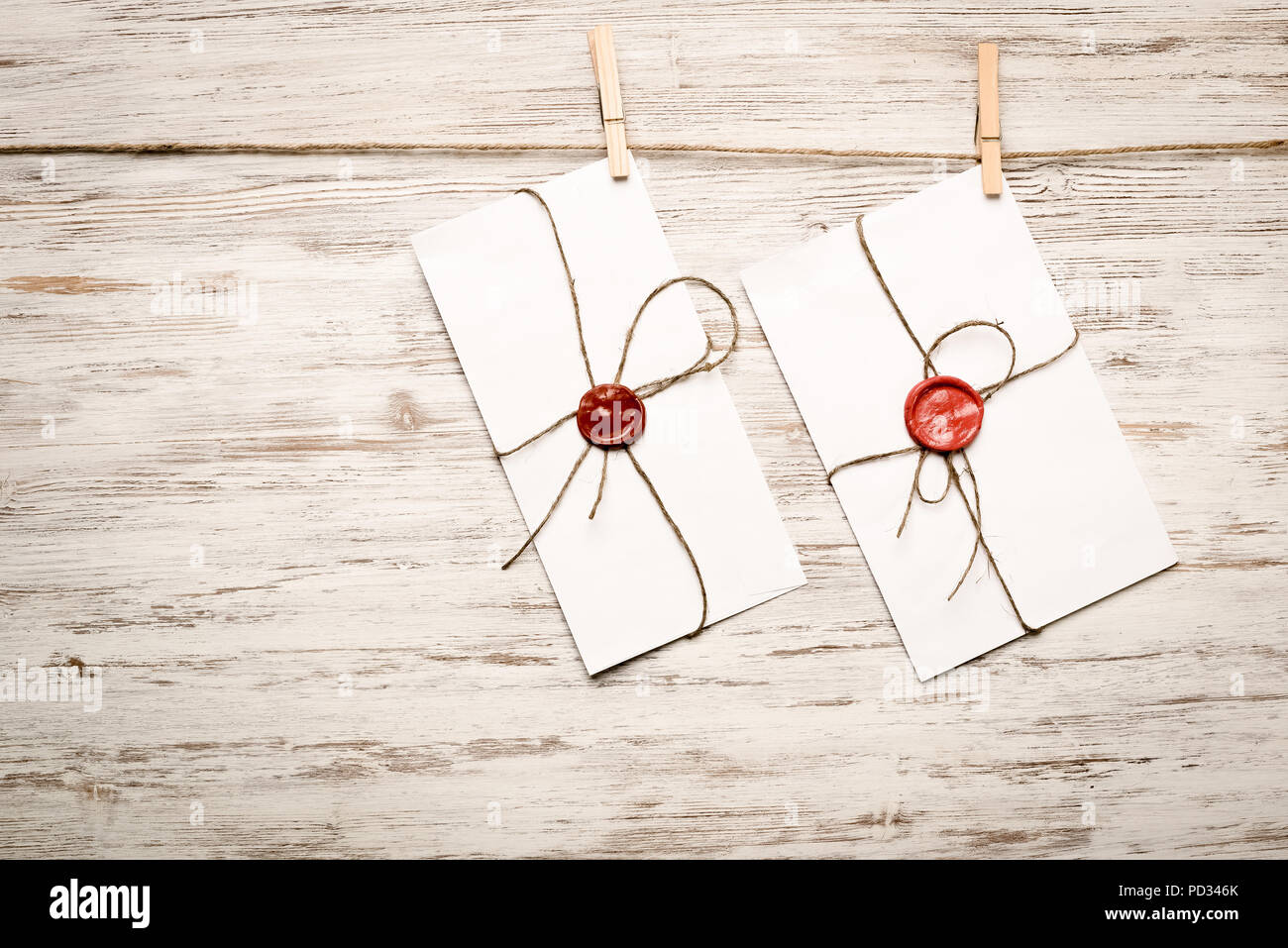 Mail envelope on rope Stock Photo - Alamy