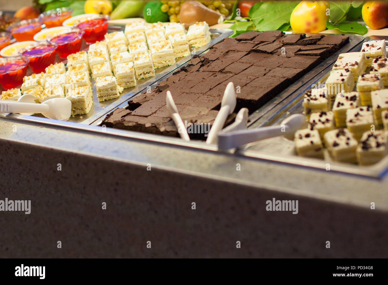 Dessert Buffet with a wide variety of Desserts on trays Stock Photo - Alamy