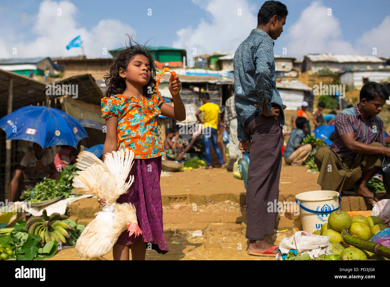 COX'S BAZAR, BANGLADESH - AUGUST 04 : Rohingya people buy and sell ...