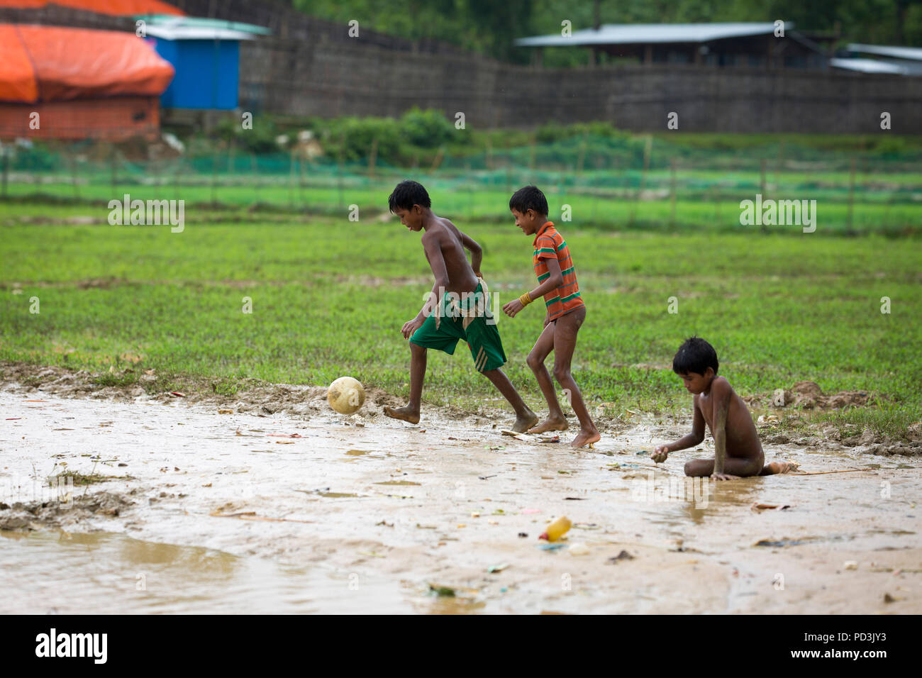 COX'S BAZAR, BANGLADESH - AUGUST 04 : Rohingya children play footbal ...