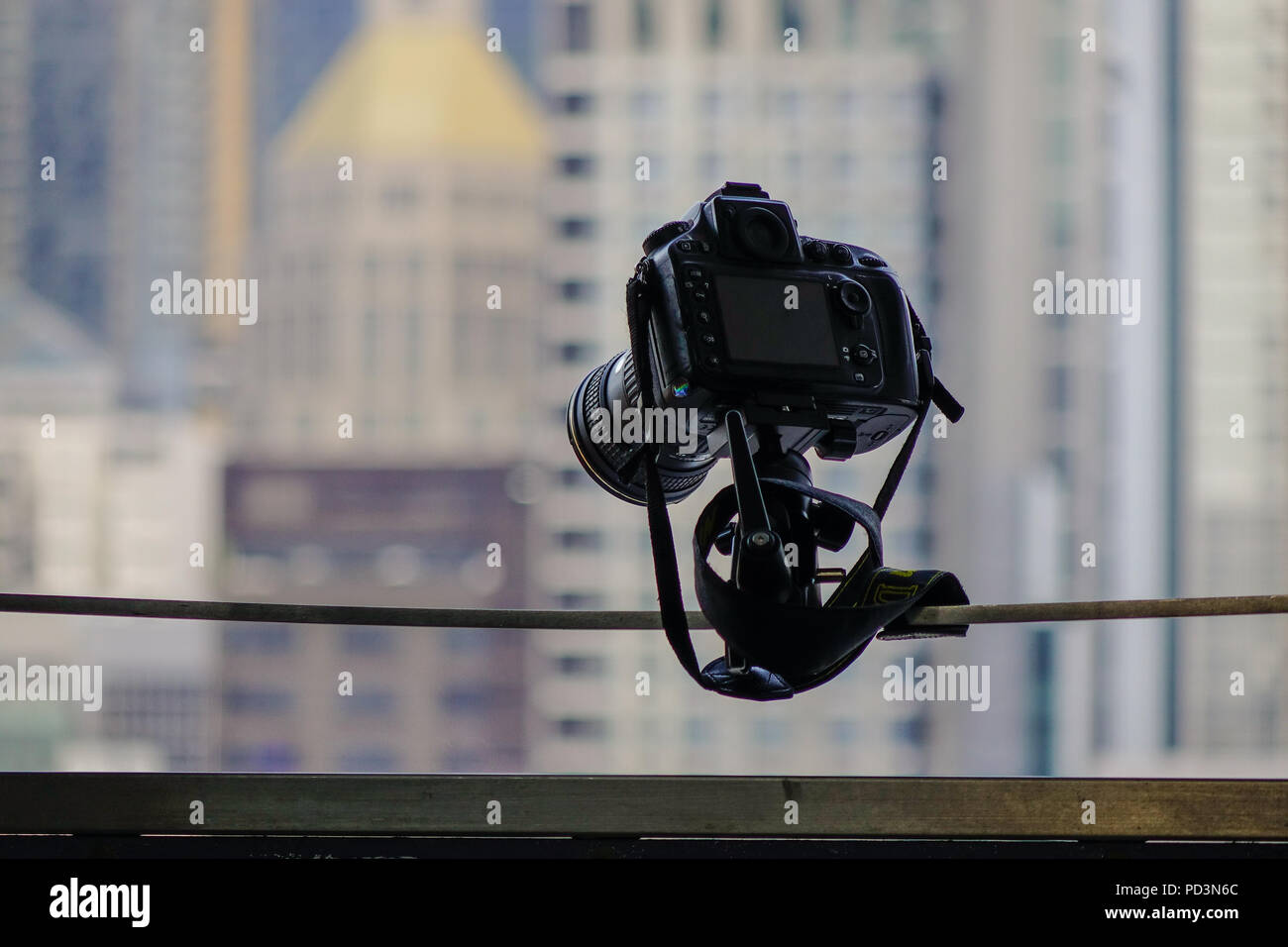 A DSLR camera in front of modern buildings Stock Photo - Alamy