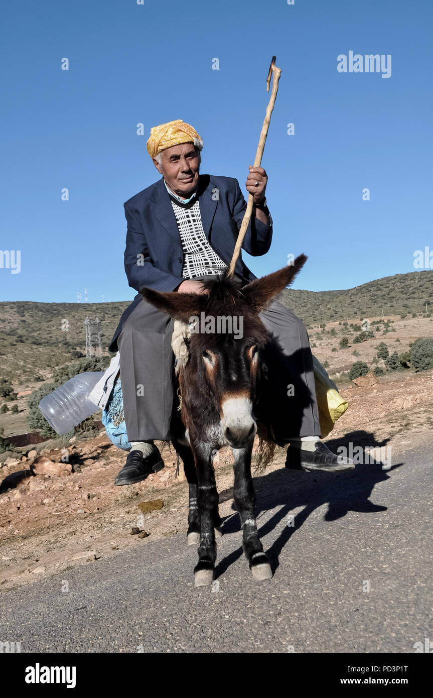 Man Riding Donkey in Morocco Stock Photo - Alamy