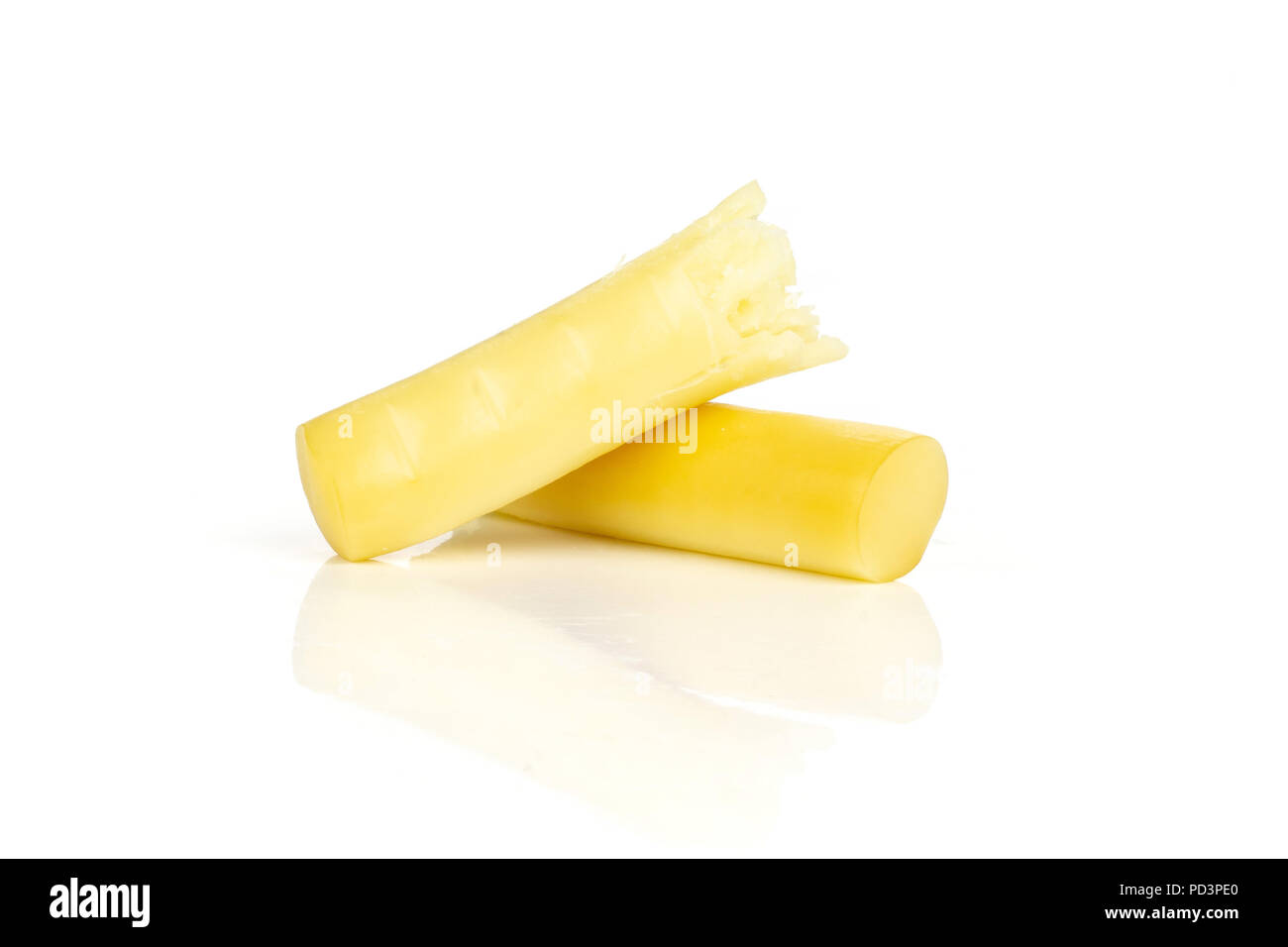 Group of two halves of smoked slovak string cheese stick isolated on ...
