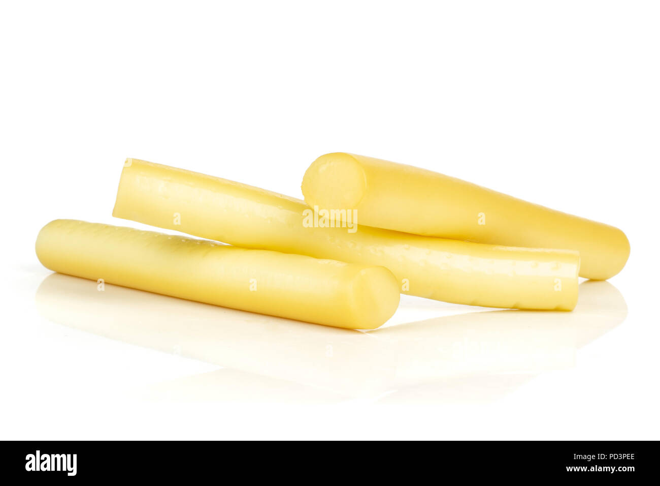 Set of three whole smoked slovak string cheese stick isolated on white ...
