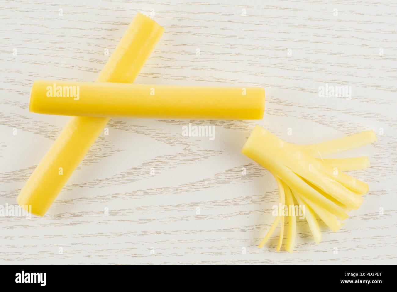 Group of two whole one piece of smoked slovak string cheese stick ...