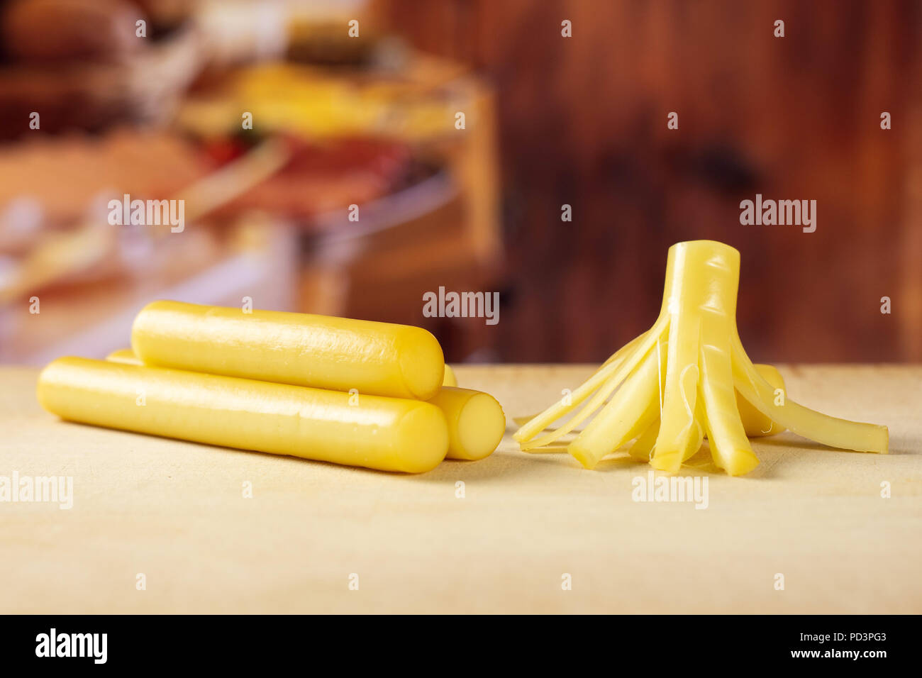 Group of three whole one piece of smoked slovak string cheese stick ...