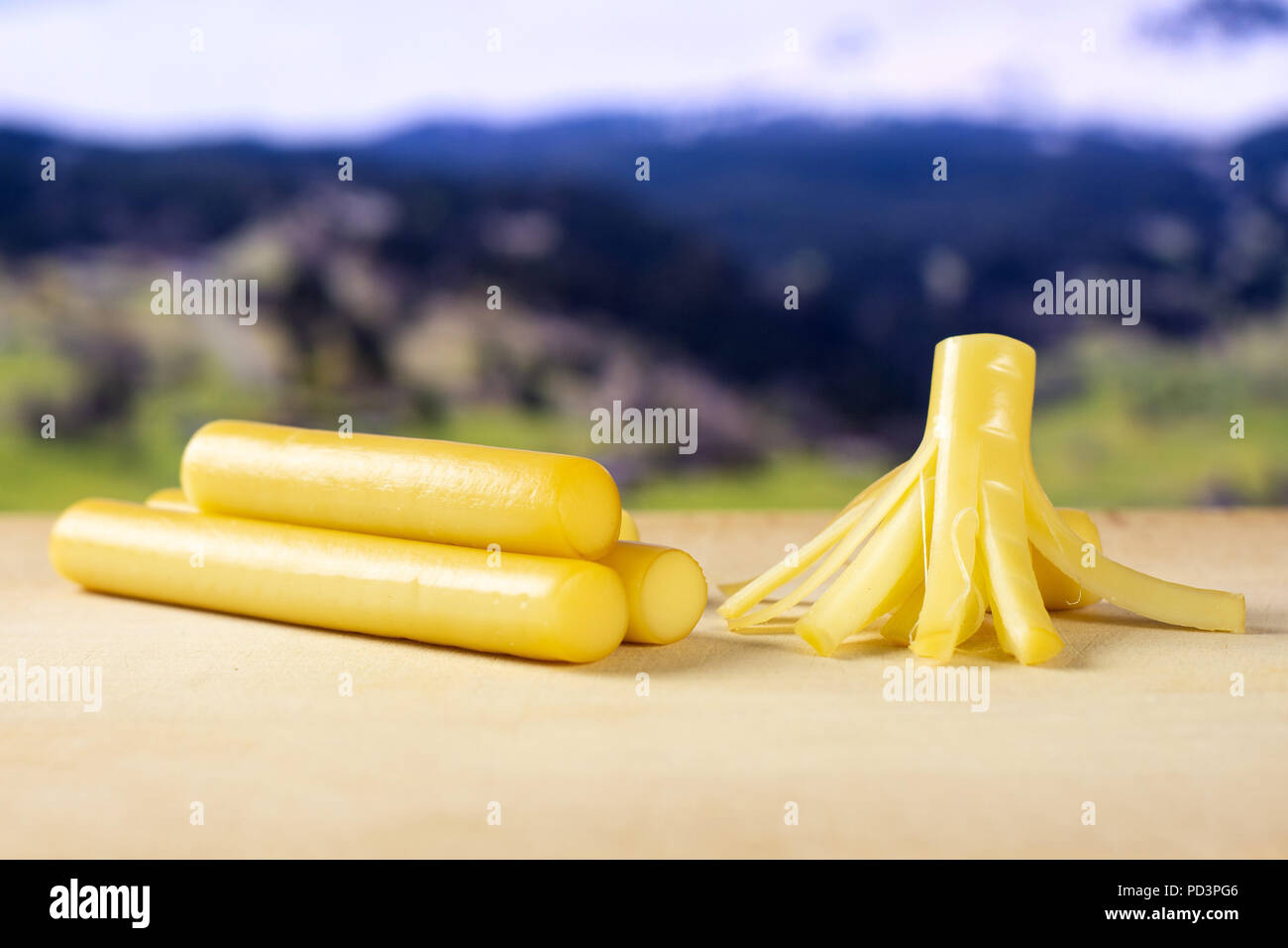 Group of three whole one piece of smoked slovak string cheese stick ...