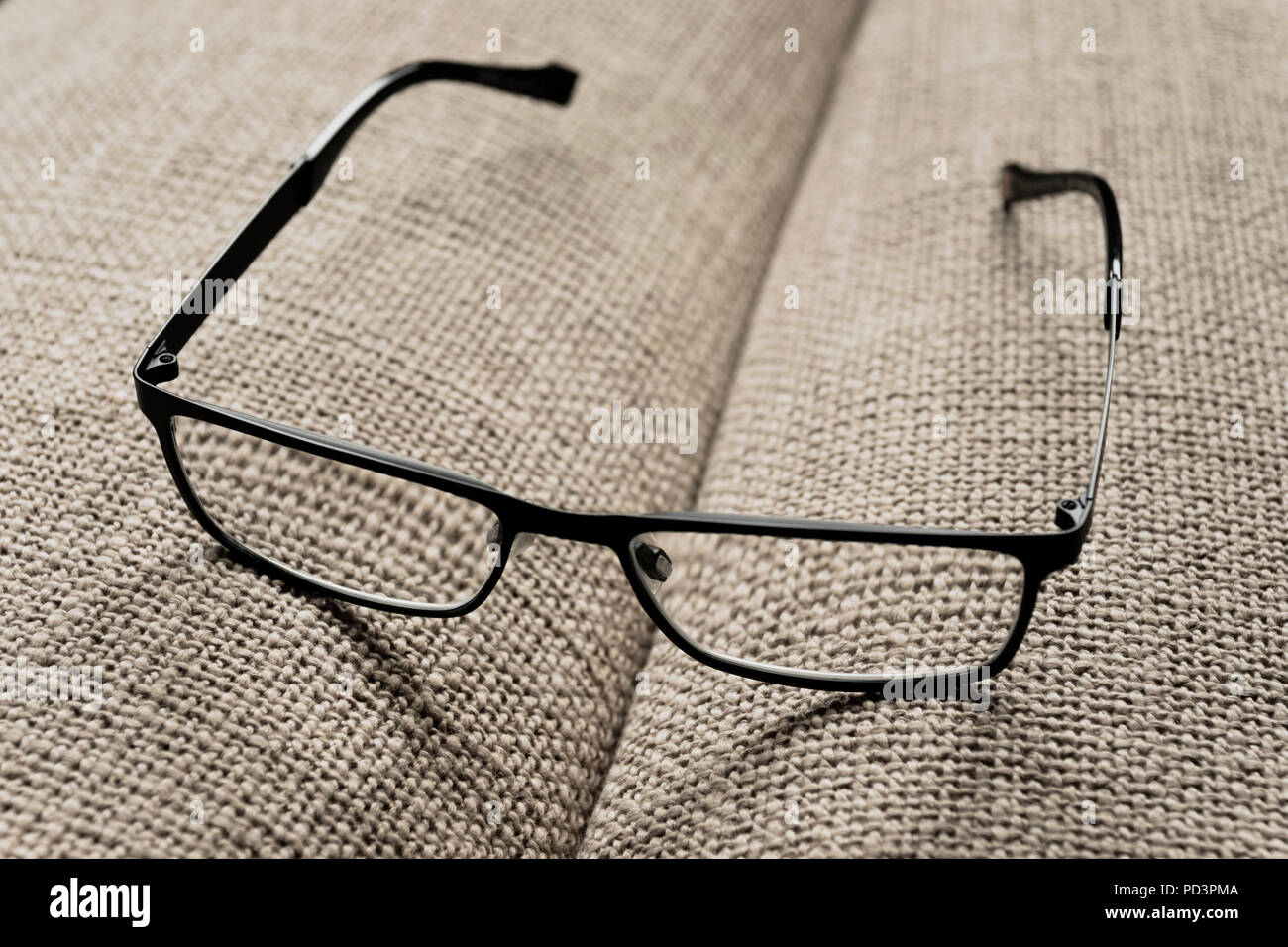 A pair of spectacles with black metal frames Stock Photo - Alamy