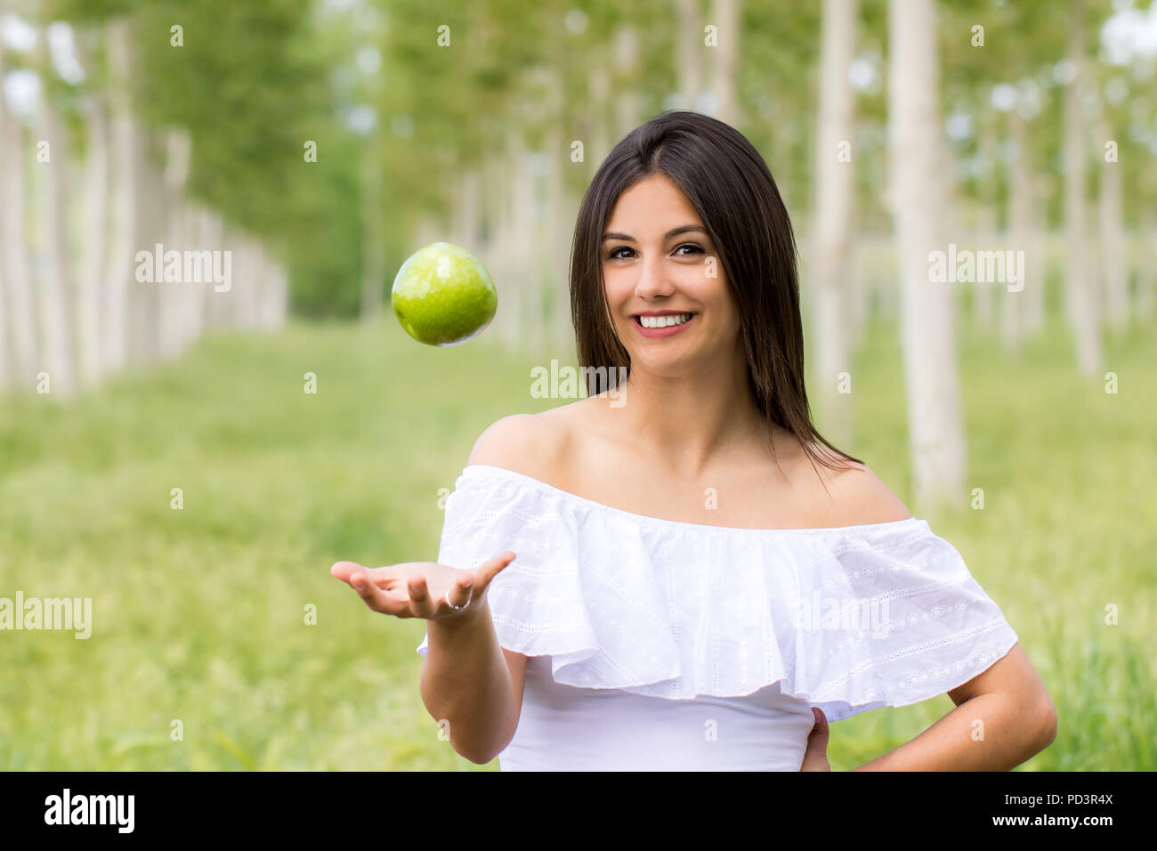 Throwing An Apple High Resolution Stock Photography and Images - Alamy