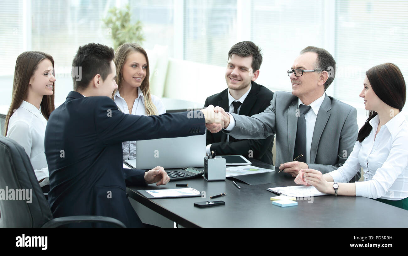 business partners shaking hands after a successful transaction Stock ...