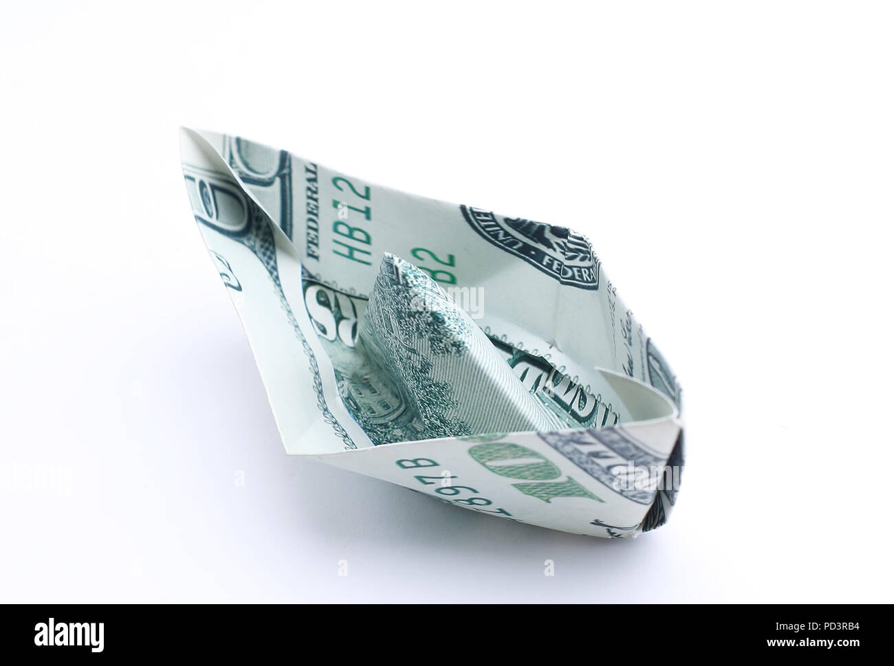 boat made origami from dollar bills.isolated on a white background ...