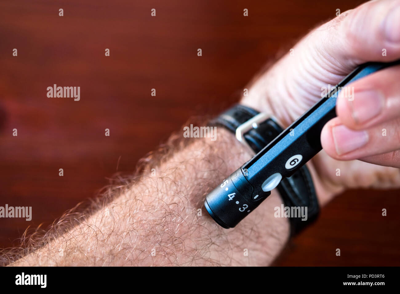 Lancing device used for blood glucose testing Stock Photo - Alamy