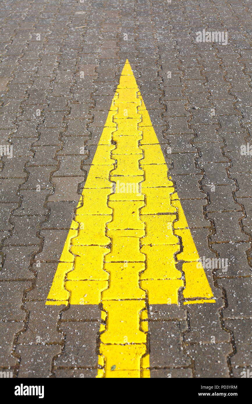 Yellow Arrow, Yellow Road Marking Stock Photo - Alamy