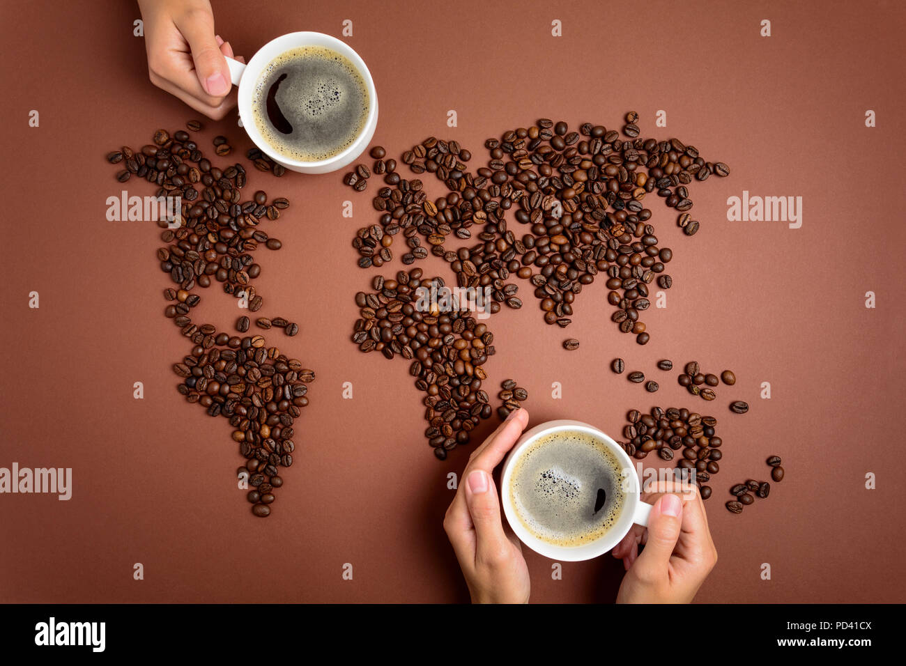 Map of the world made of roasted arabica coffee beans on brown paper ...