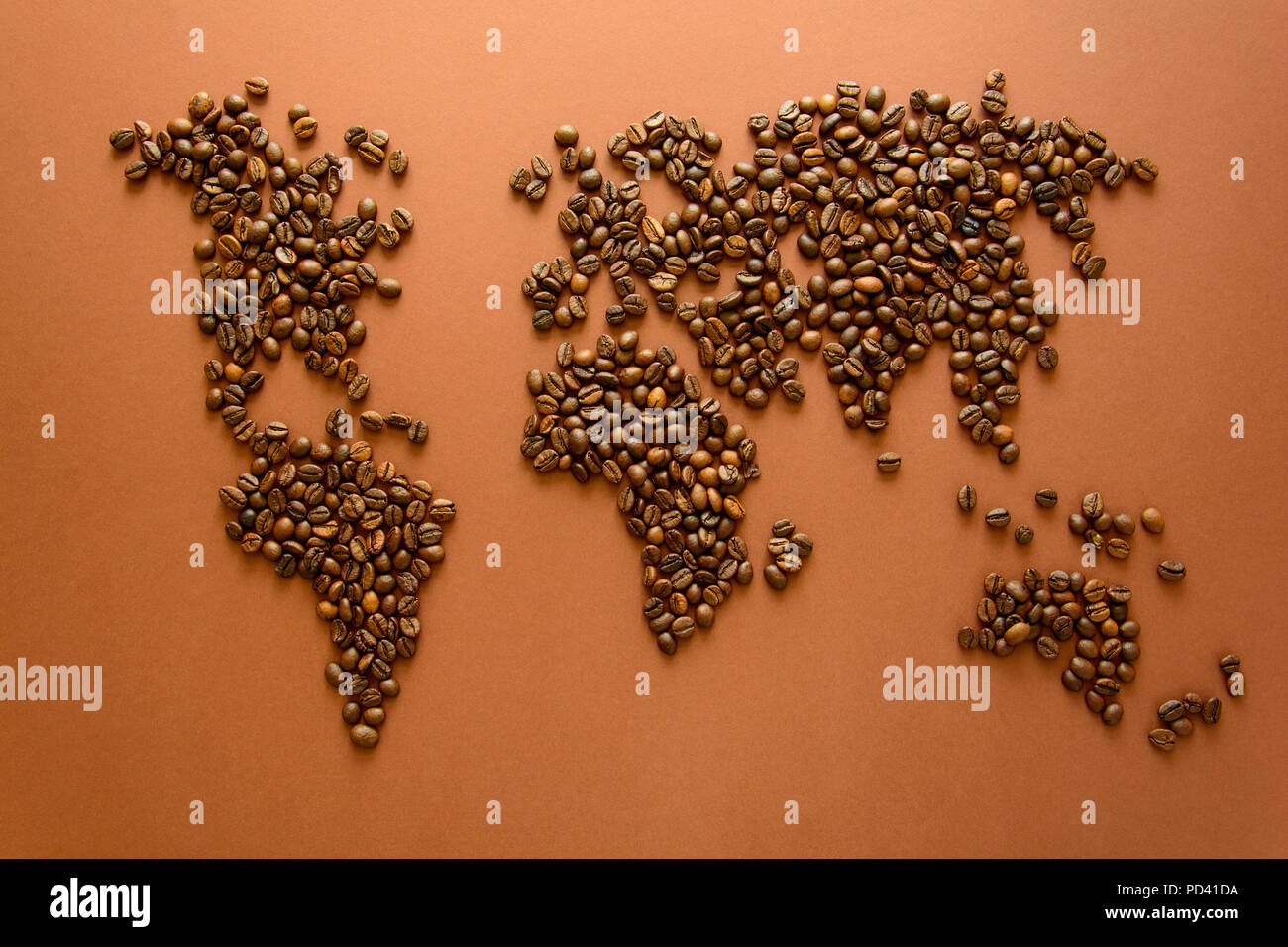 Map of the world made of roasted arabica coffee beans on brown paper ...