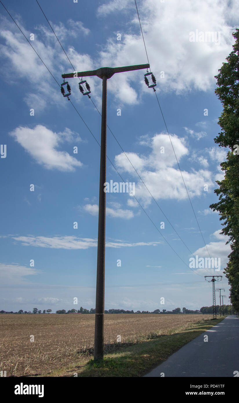 Catenary; the form of a cable or chain that hangs in a gravitational ...