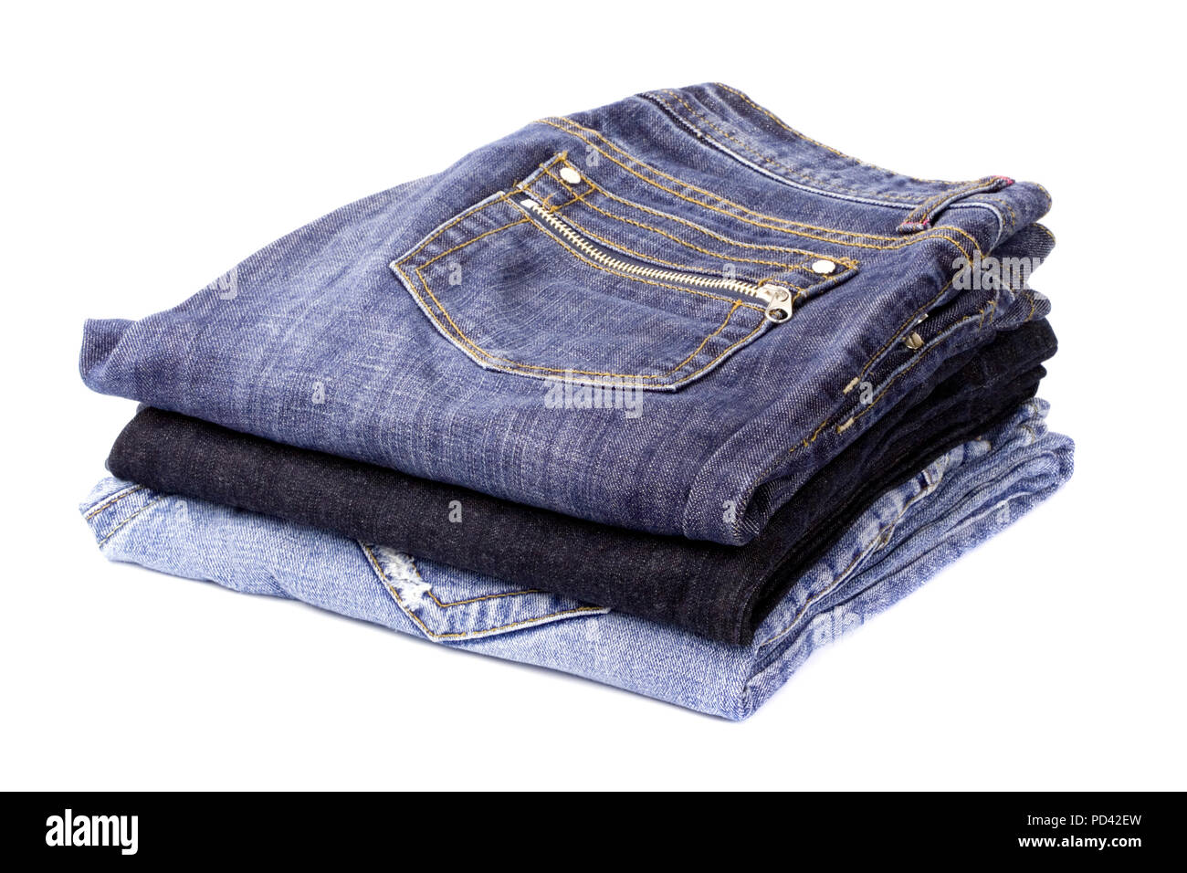 stack of blue jeans isolated on white background Stock Photo - Alamy