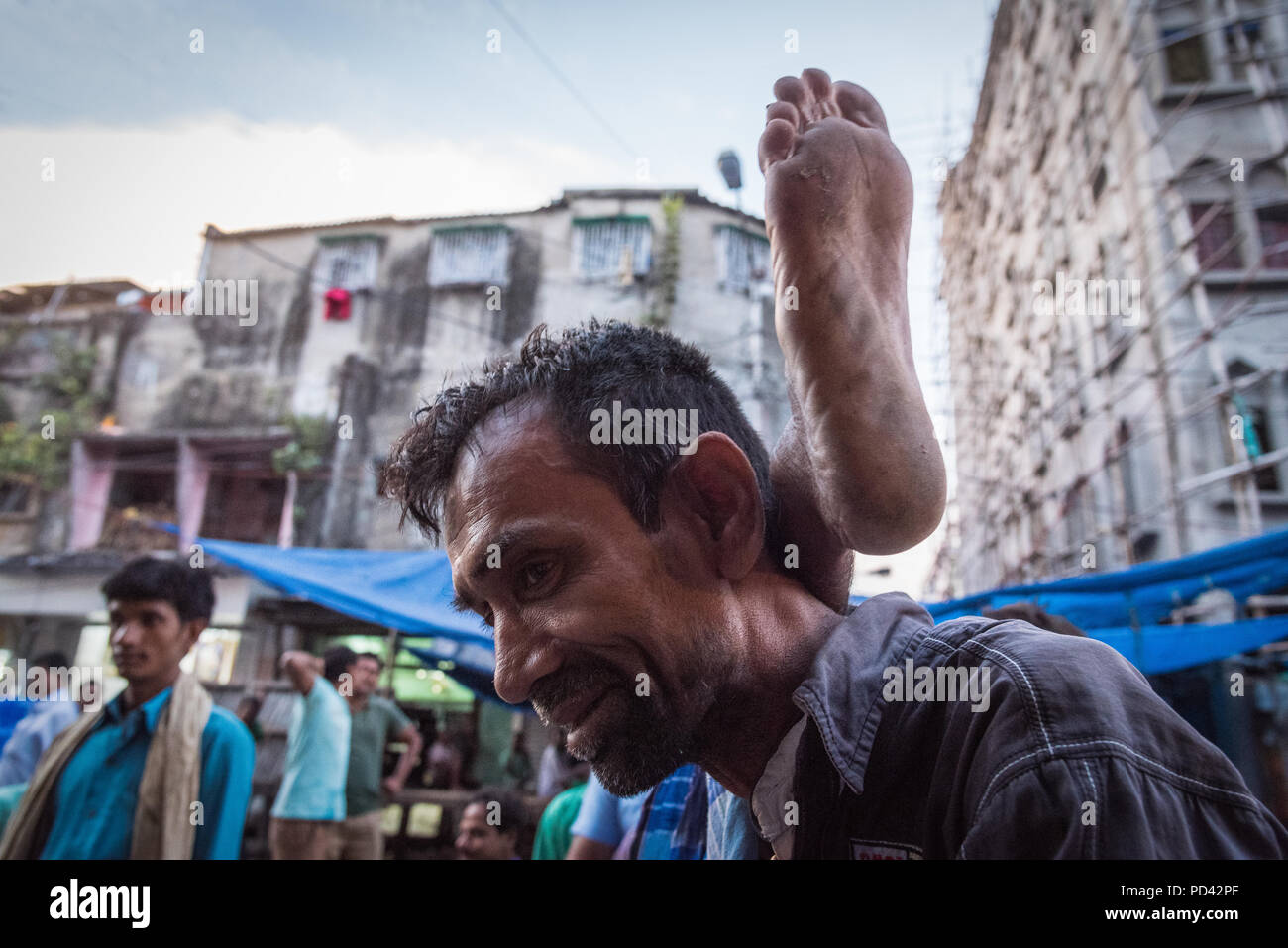 Foot behind the head hi-res stock photography and images - Alamy