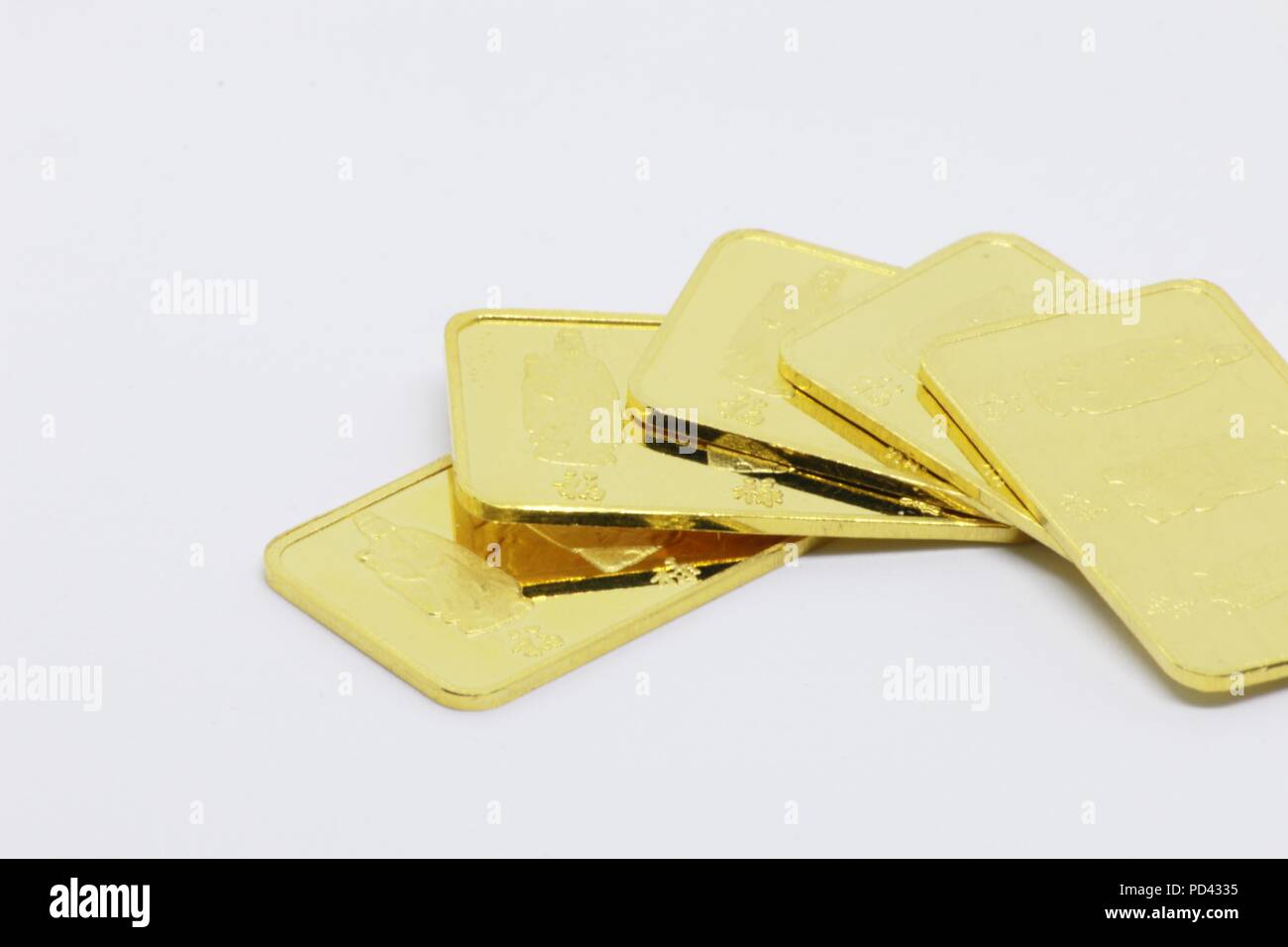 Gold bar ingot close up on the US money dollar background Stock Photo ...