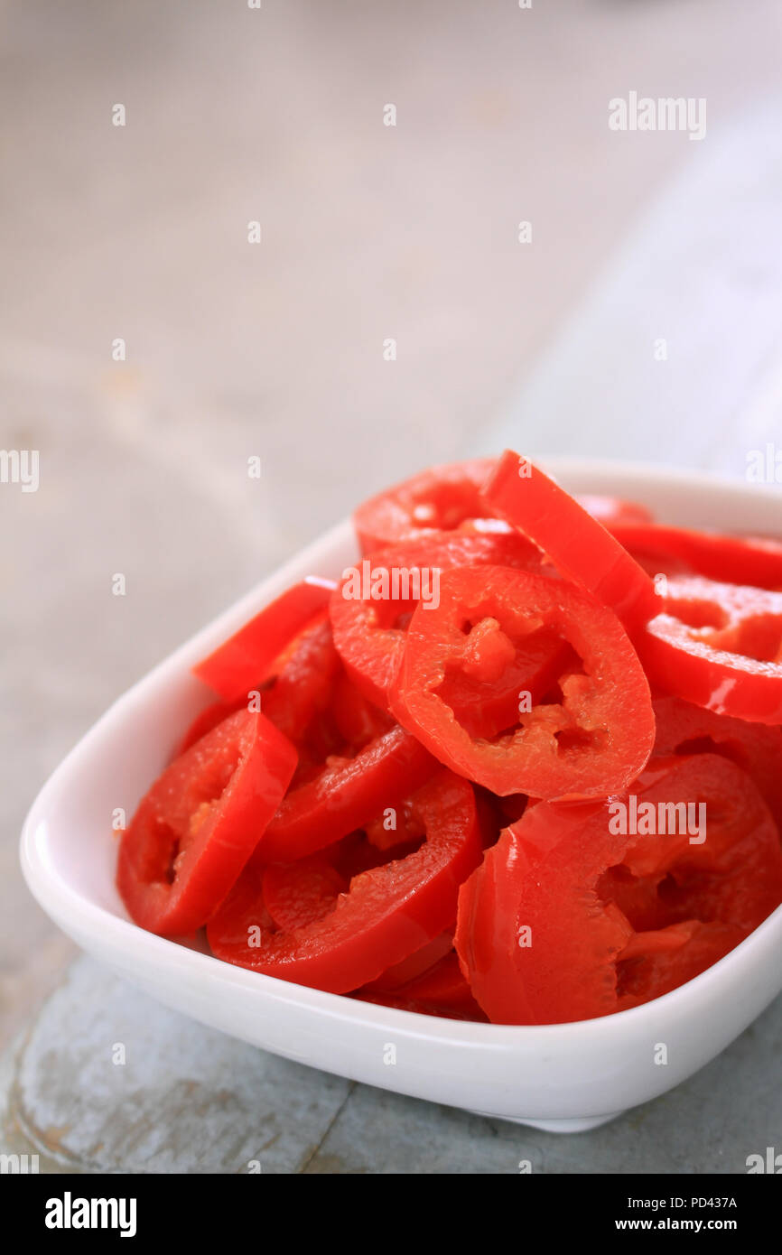 prepared sliced red chillies Stock Photo - Alamy