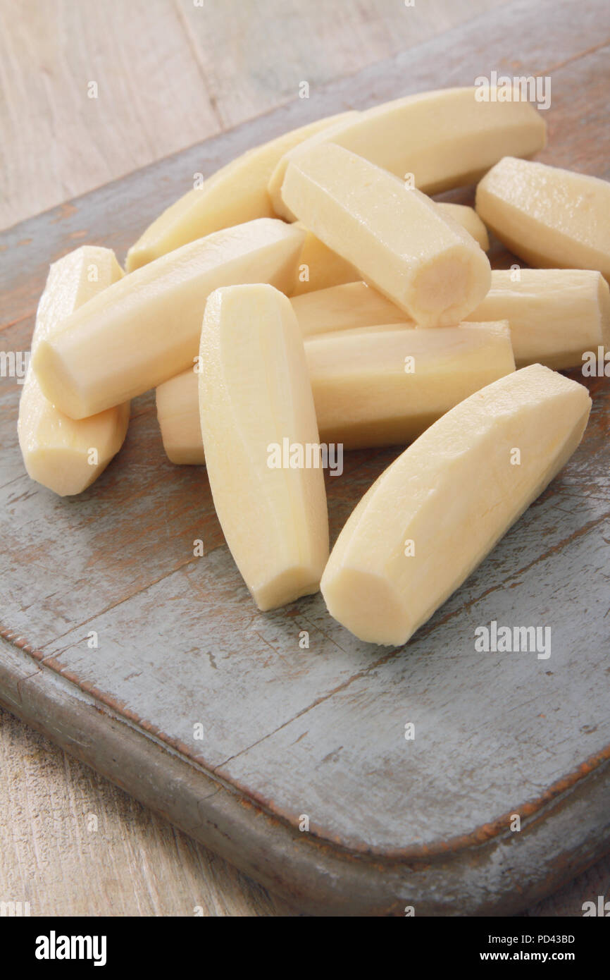 preparing fresh parsnips Stock Photo - Alamy