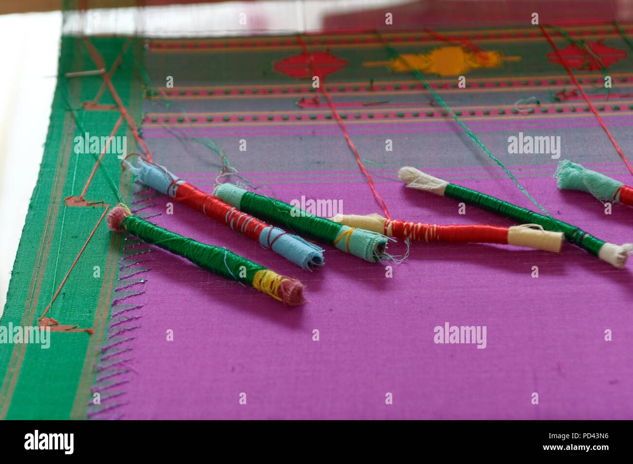 weaving of silk threads with gold thread a speciality of town Paithan ...