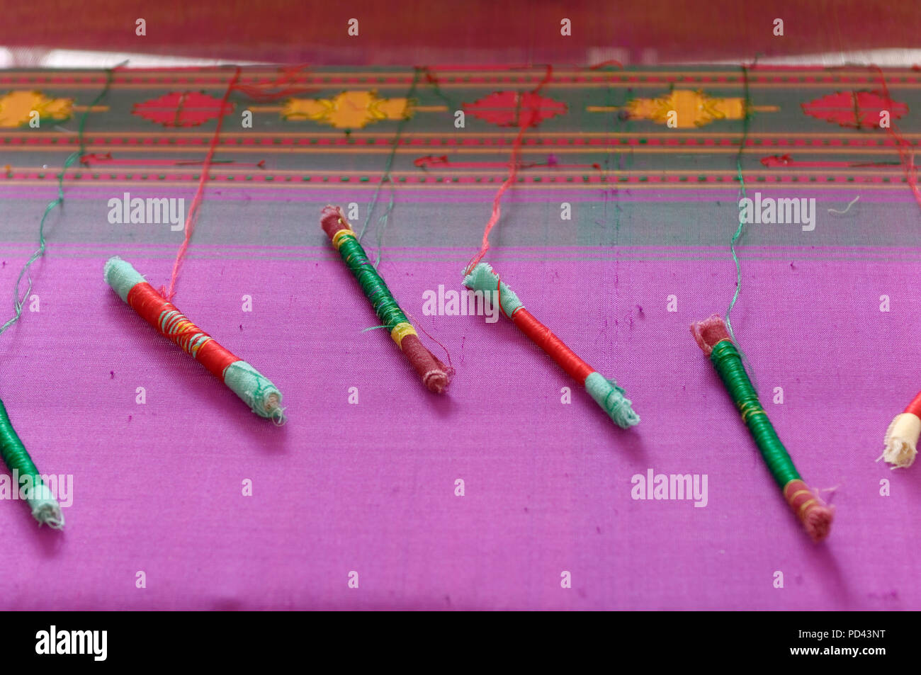 weaving of silk threads with gold thread a speciality of town Paithan ...