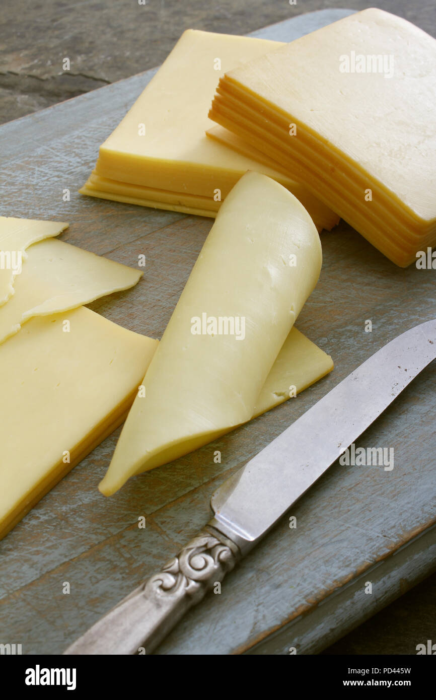 sliced cheese portions Stock Photo - Alamy