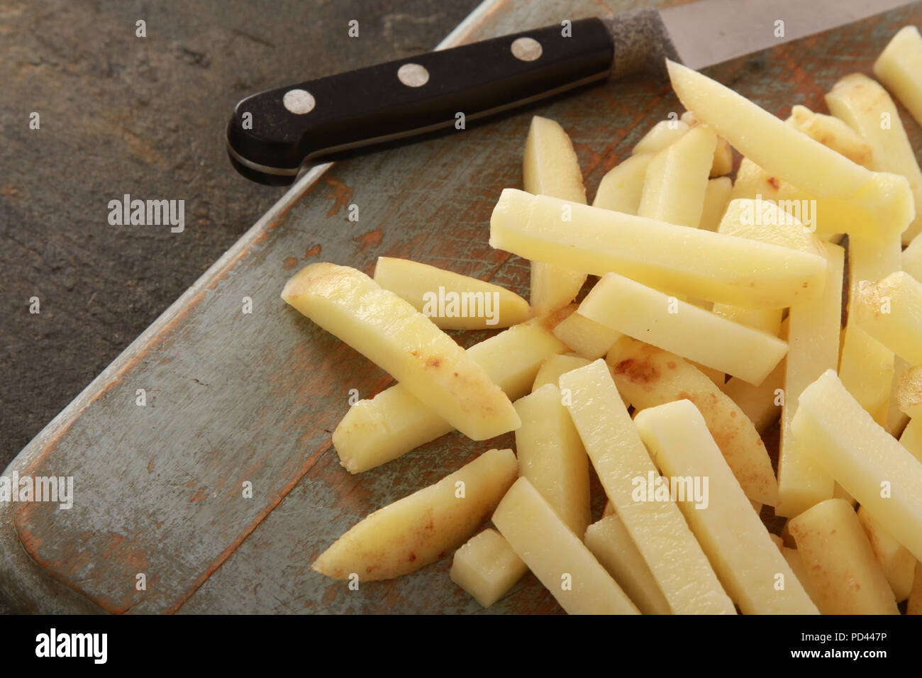 Chipping Potatoes High Resolution Stock Photography and Images - Alamy